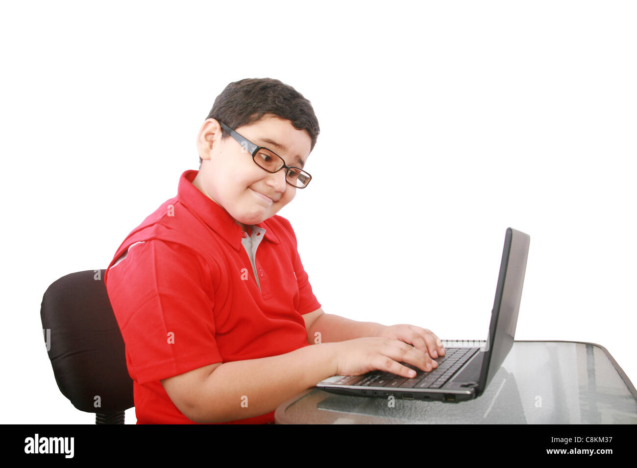 young boy with computer isolated on white Stock Photo - Alamy