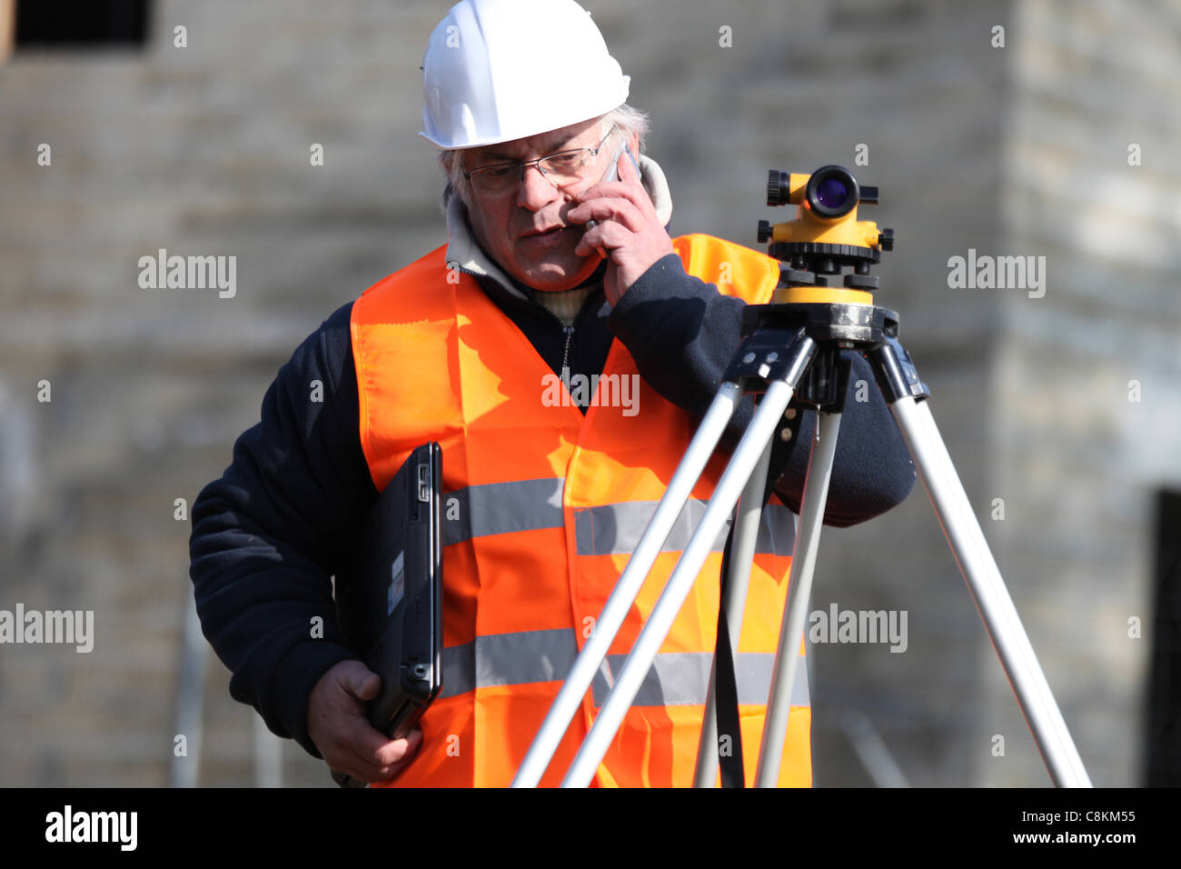 Man surveying site Stock Photo - Alamy