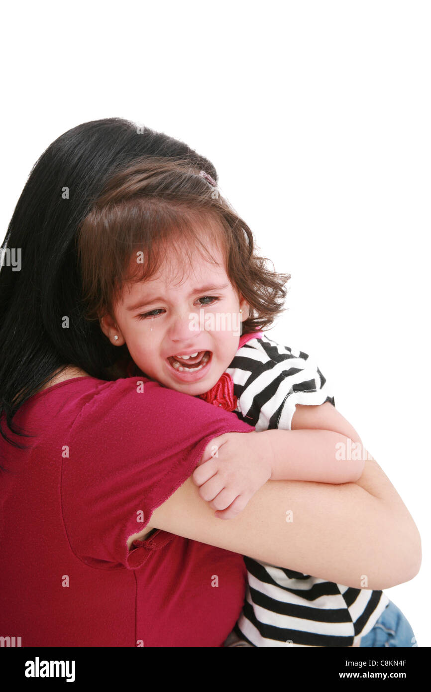 Little girl crying in mothers arm hi-res stock photography and images ...