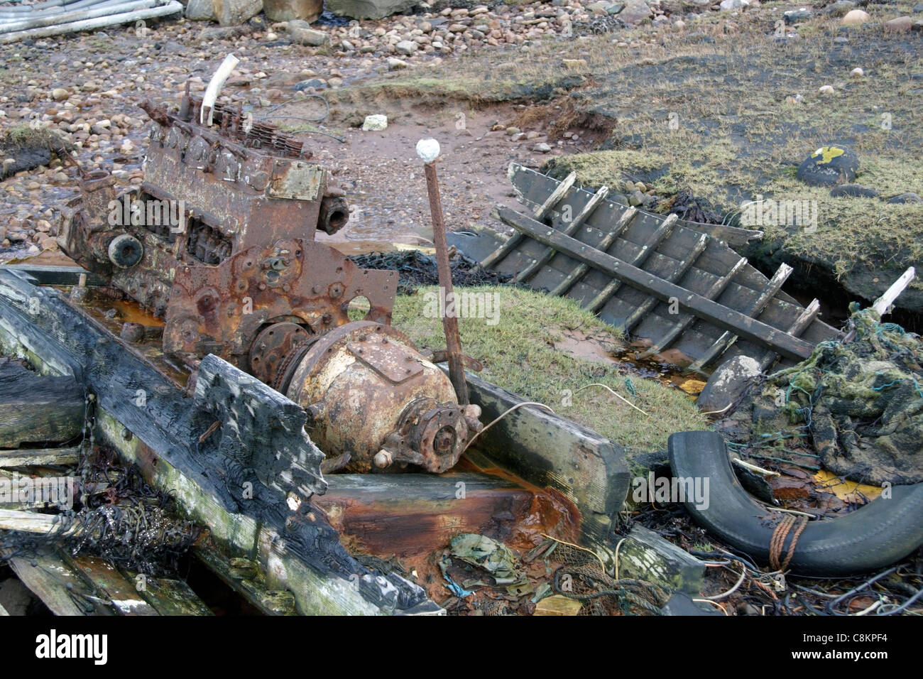 detail of a old rotten boat with engine in Scotland Stock Photo - Alamy