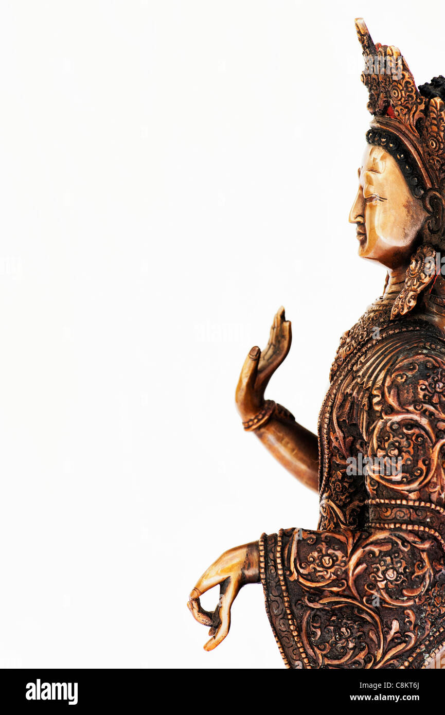 Standing Buddhist deity statue on white background Stock Photo - Alamy