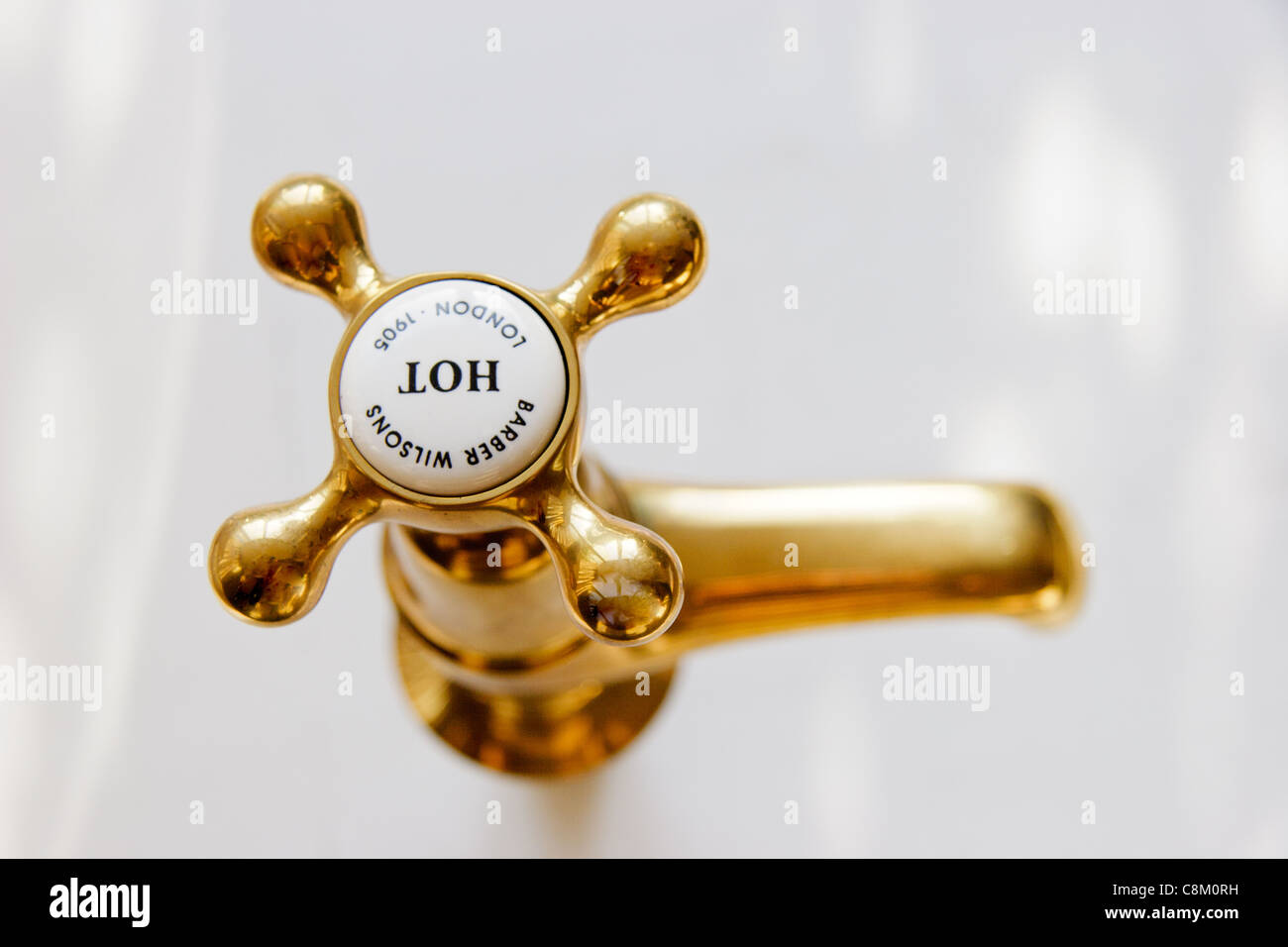 Old fashioned brass water tap Stock Photo - Alamy