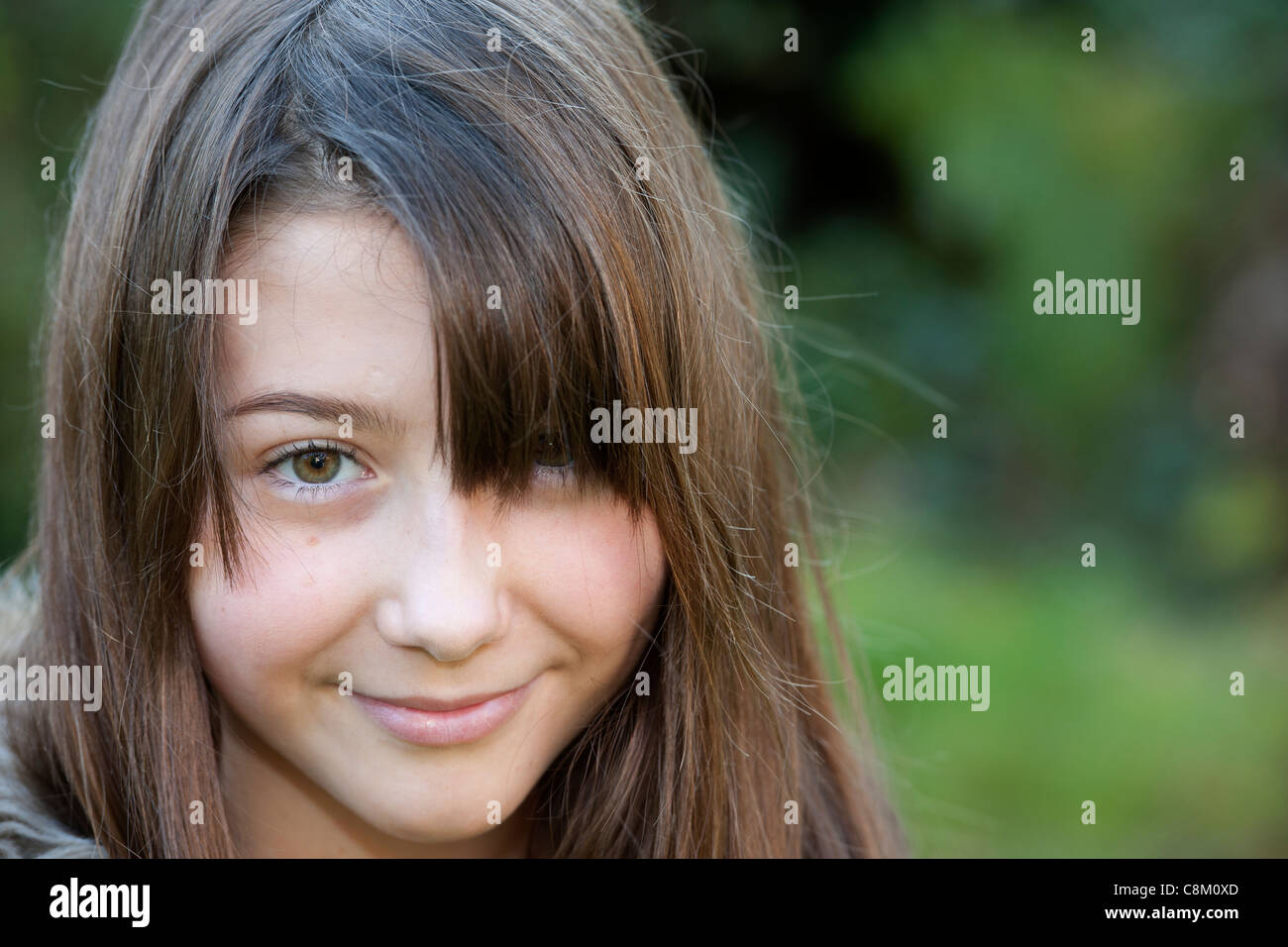 Young English girl smiling posing at camera Stock Photo - Alamy
