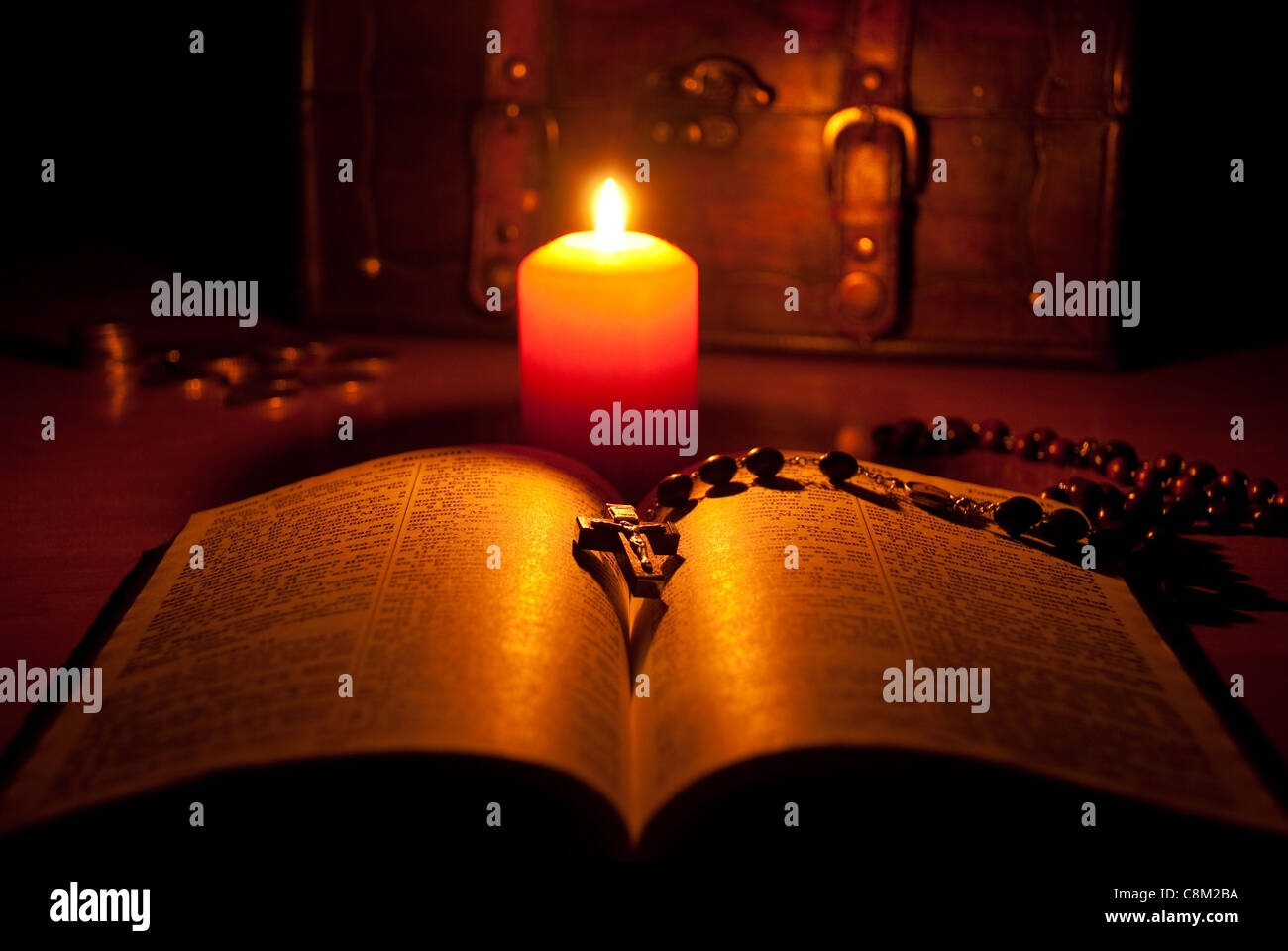 Open bible and candle hi-res stock photography and images - Alamy