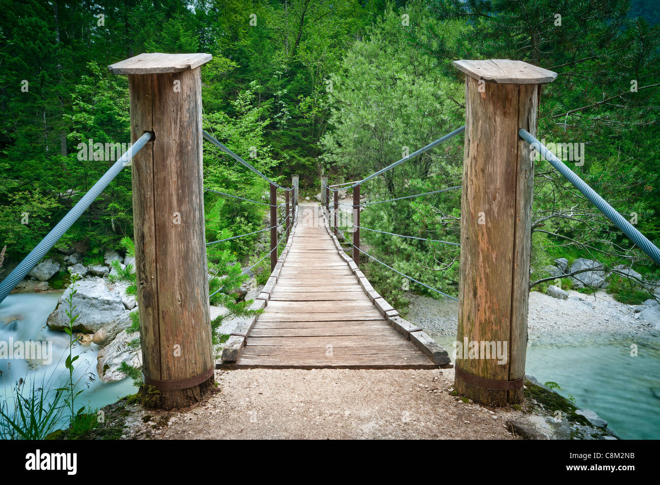 Wooden bridge mountain river in hi-res stock photography and images - Alamy