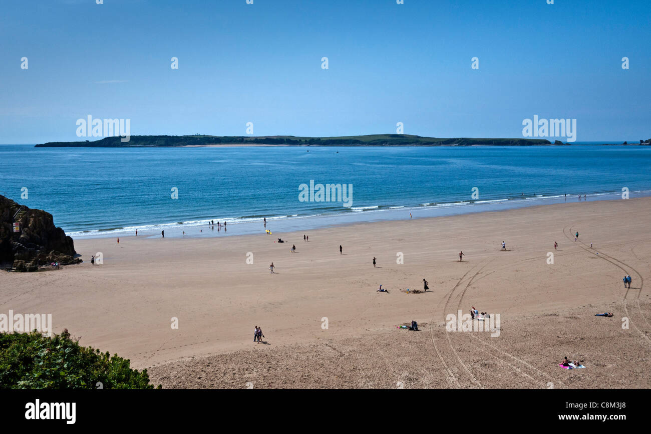 Tenby South Beach, Caldey Island in the background, South Wales, UK ...