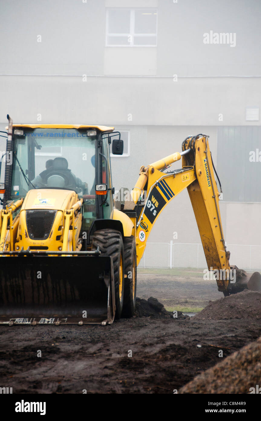 an excavator in a construction site Stock Photo - Alamy