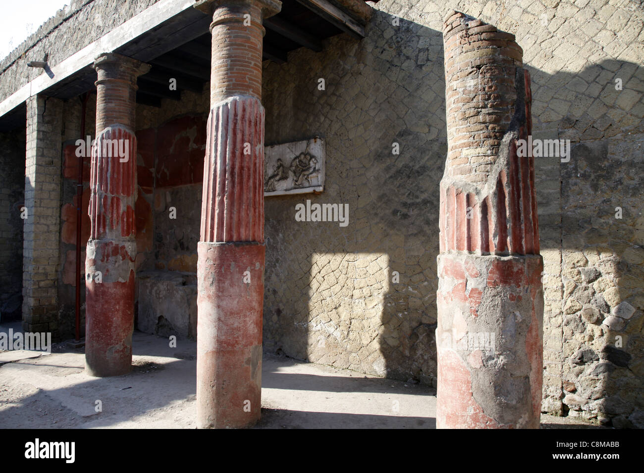 ANCIENT ROMAN RUINS RED PILARS HERCULANEUM ITALY 18 September 2011 ...