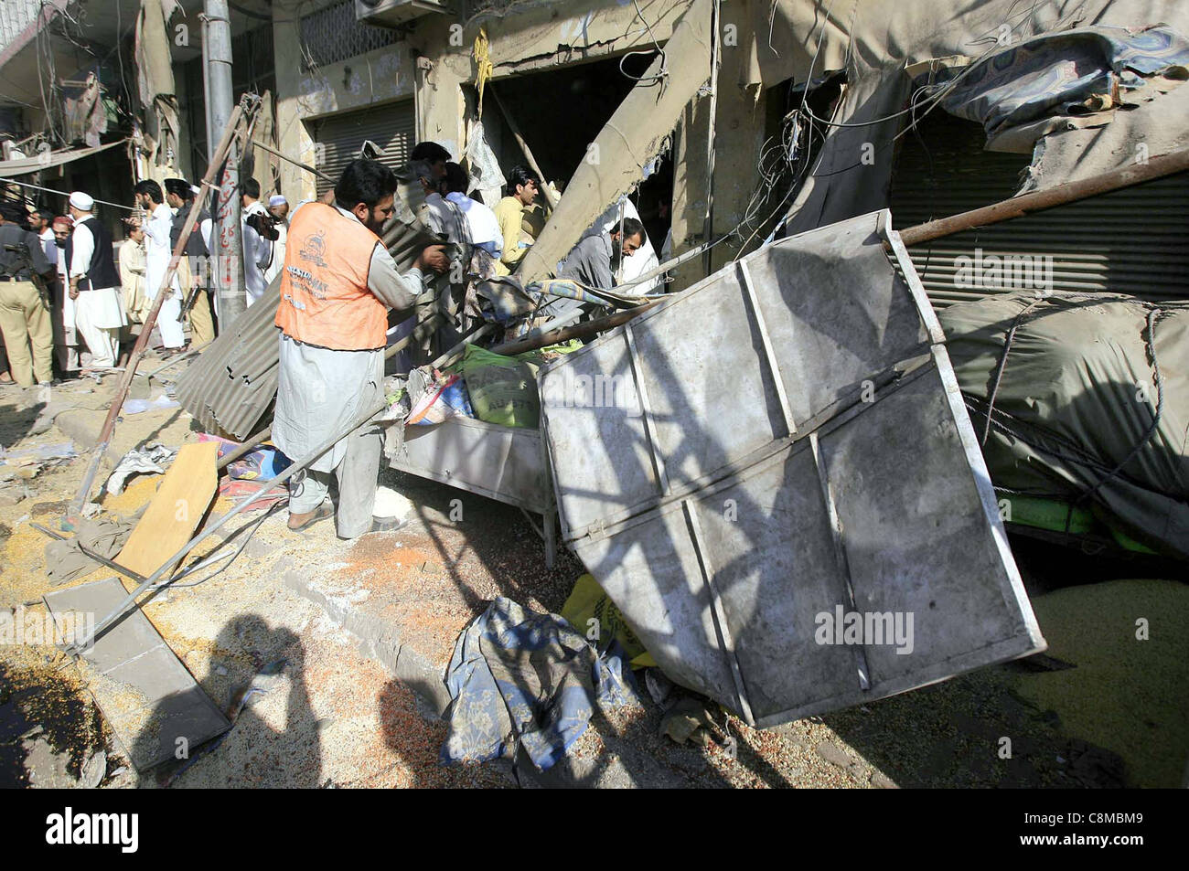 People look damaged shops which were destroyed in explosion after ...