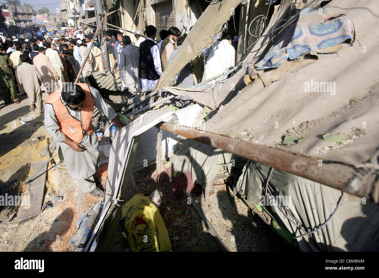 People look damaged shops which were destroyed in explosion after ...