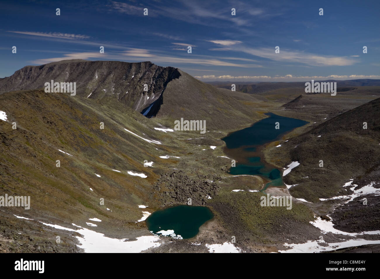 The peak of Karpinskiy. The lake Goluboe. View from slope of the ...