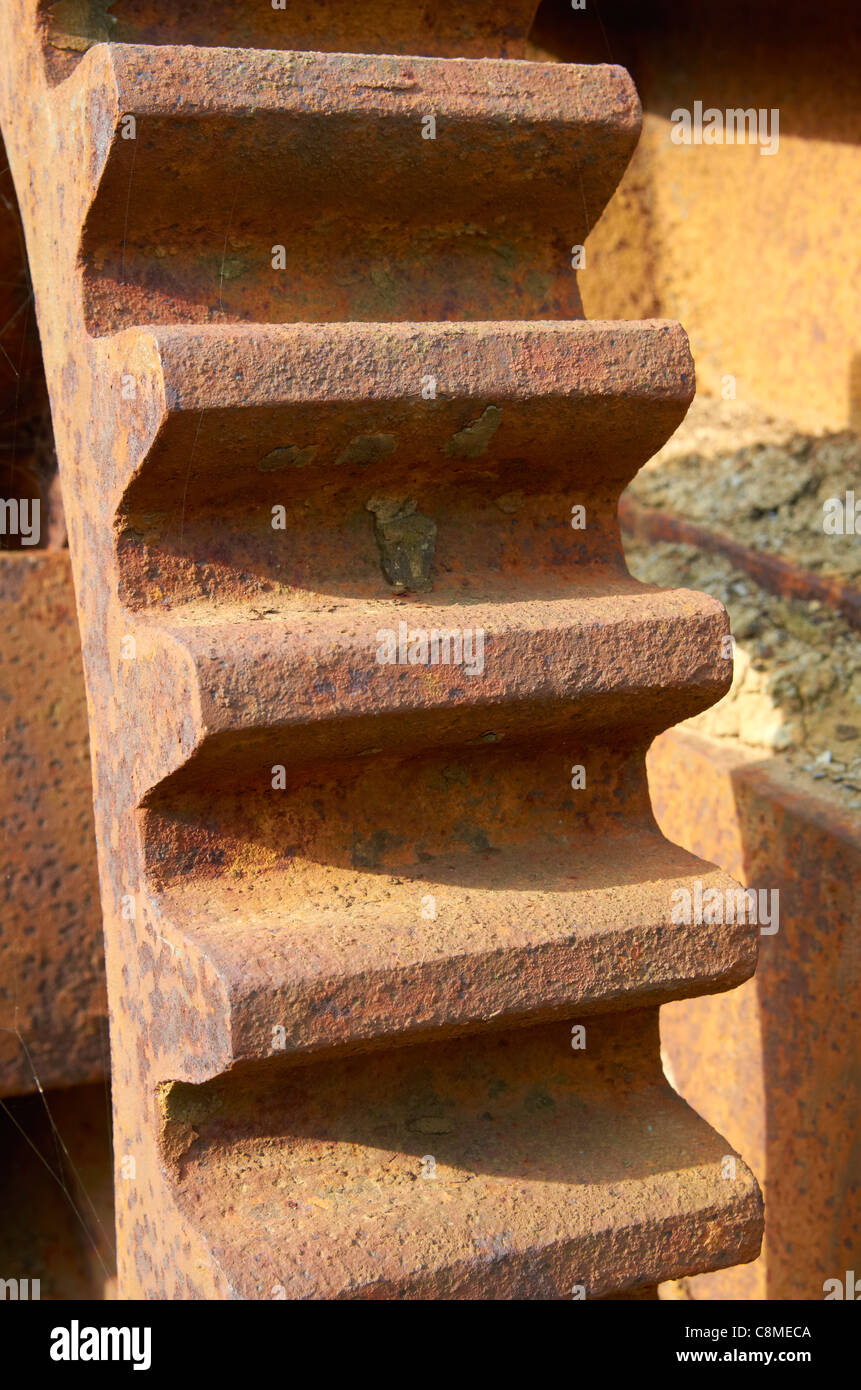 Rusty iron and steel cog or gear wheels on old industrial machinery ...