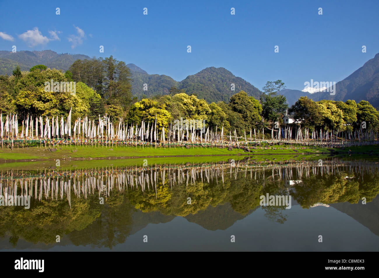 Prayer flags surrounding Kathok Lake Yuksom Sikkim India Stock Photo ...