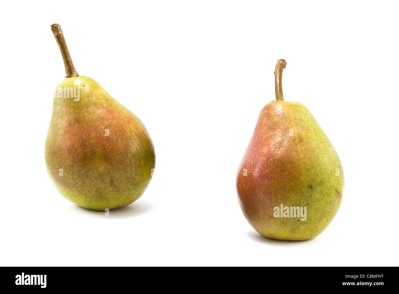 two pears isolated on a white background Stock Photo - Alamy