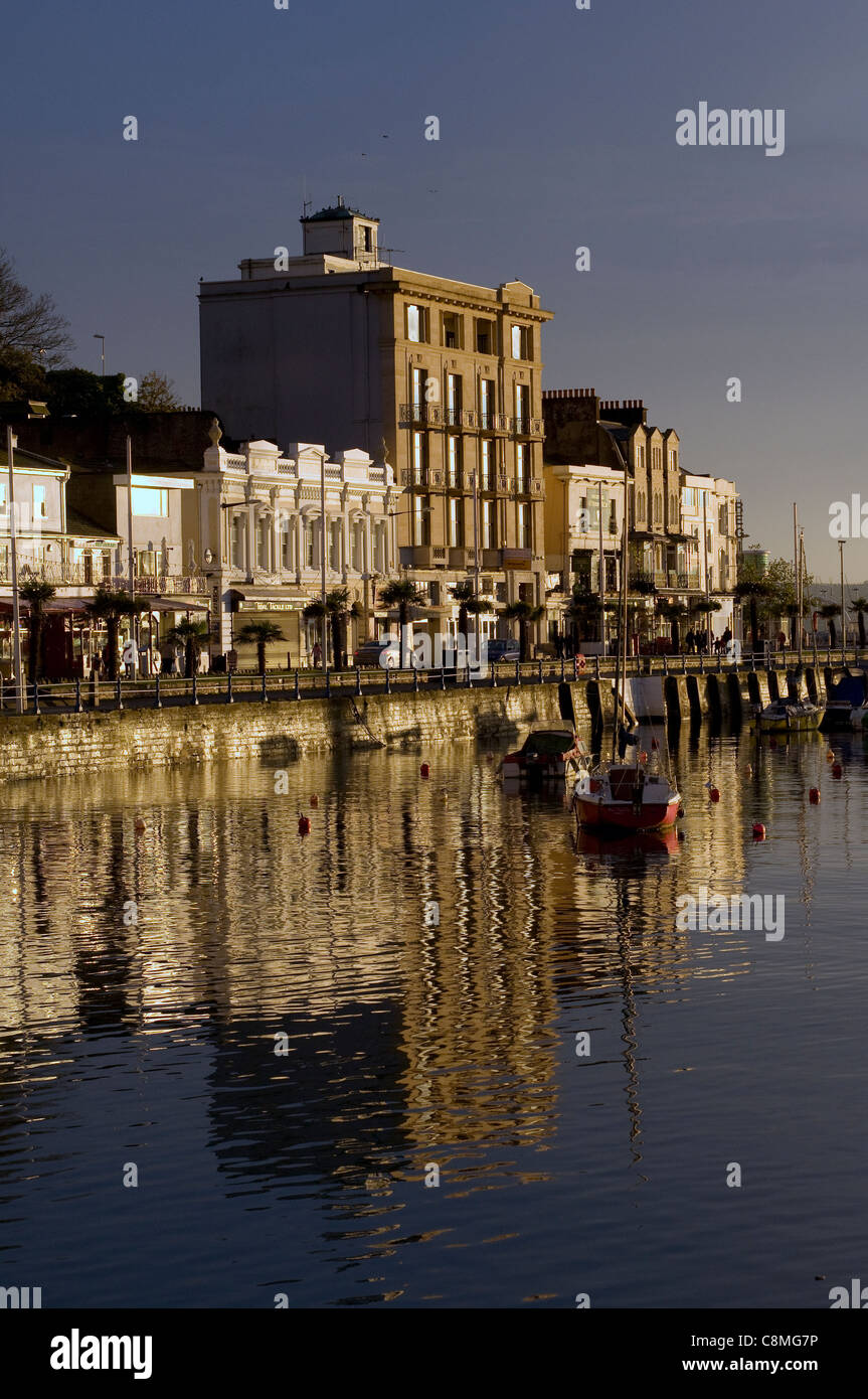 Golden lights bathes buildings of torquay hi-res stock photography and ...