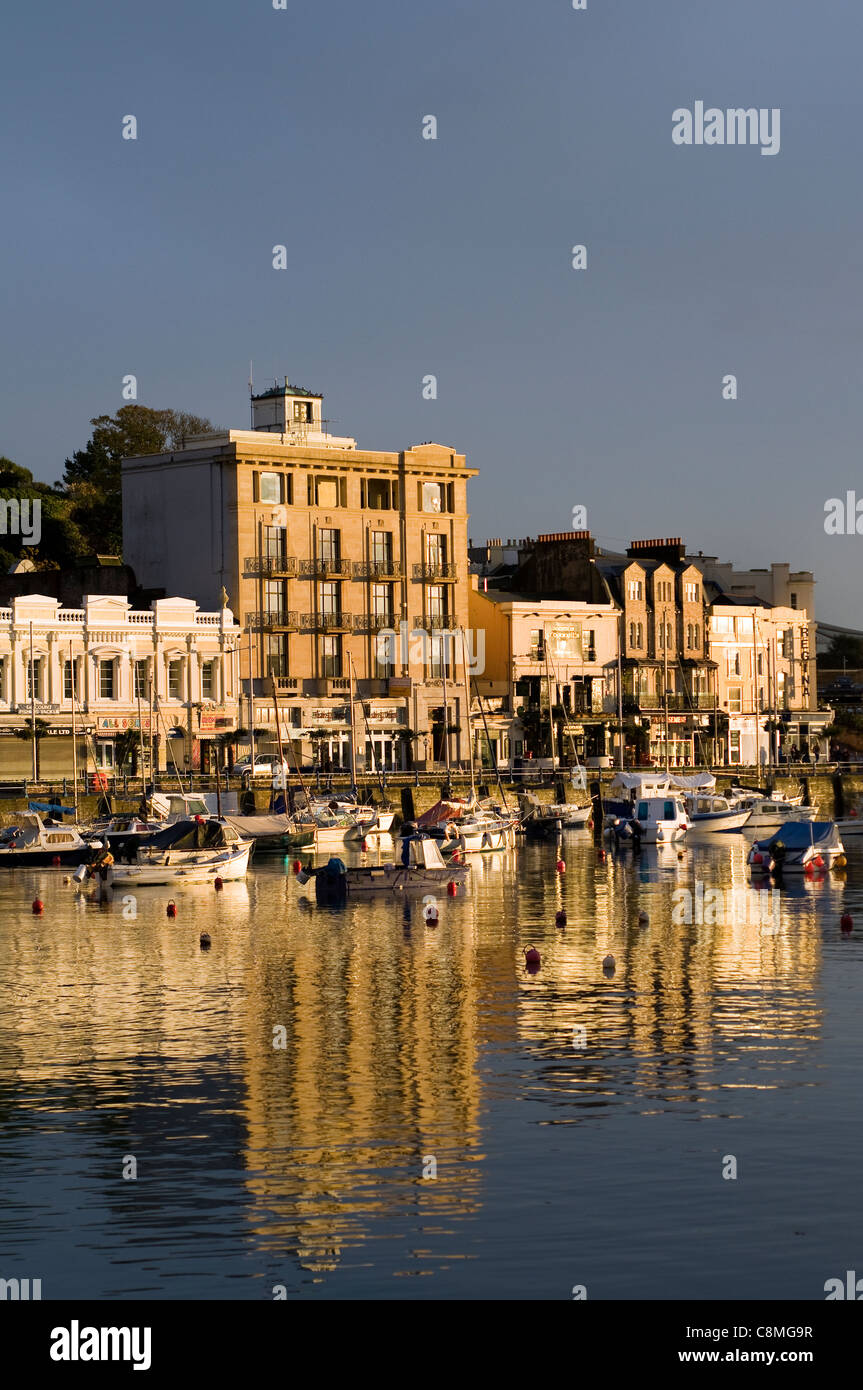 Golden lights bathes buildings of torquay hi-res stock photography and ...
