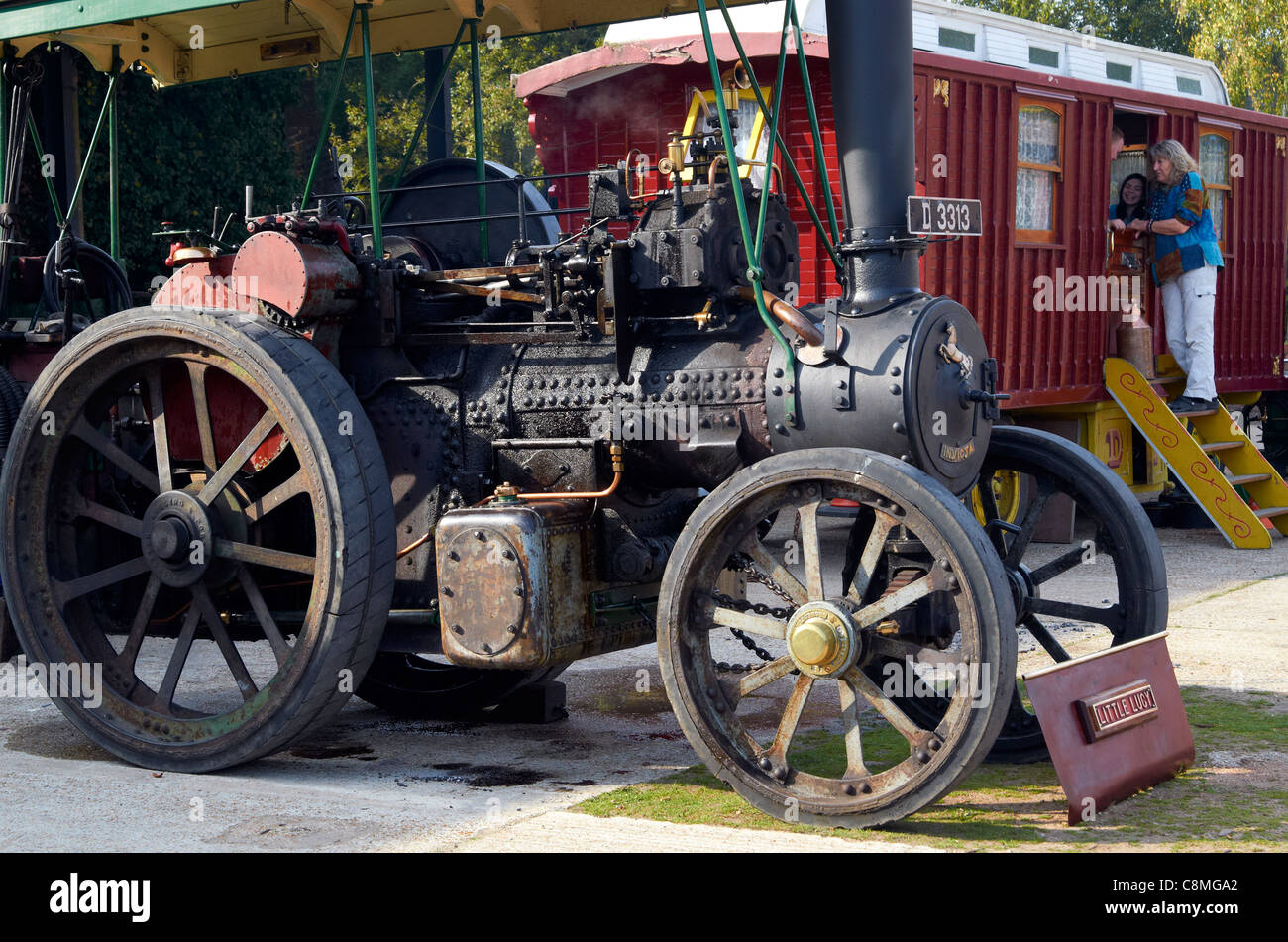 Decrepit steam traction engine with large showman's living van in the ...