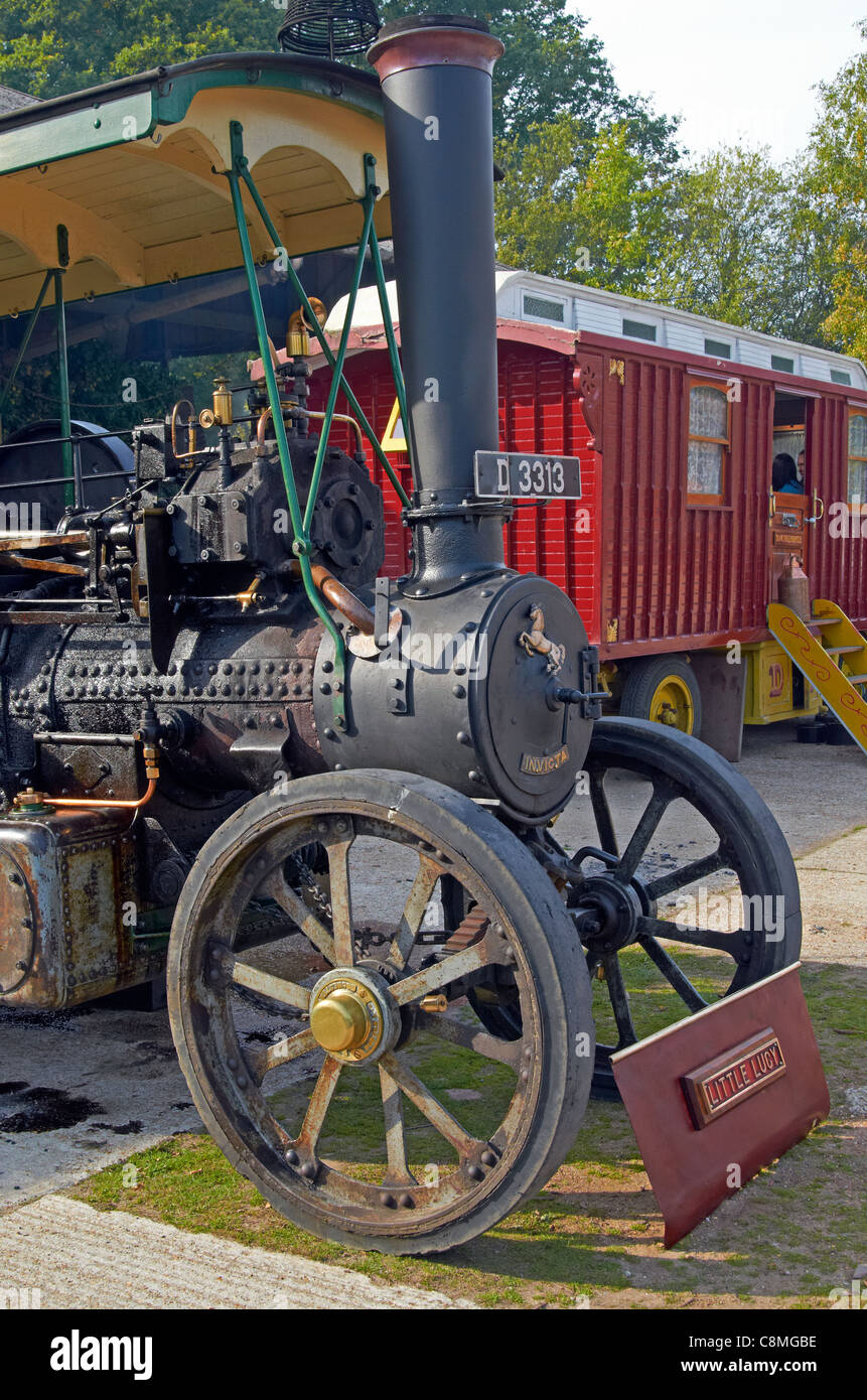 Decrepit steam traction engine with large showman's living van in the ...