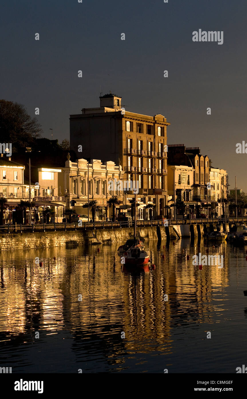 Golden lights bathes buildings of torquay hi-res stock photography and ...