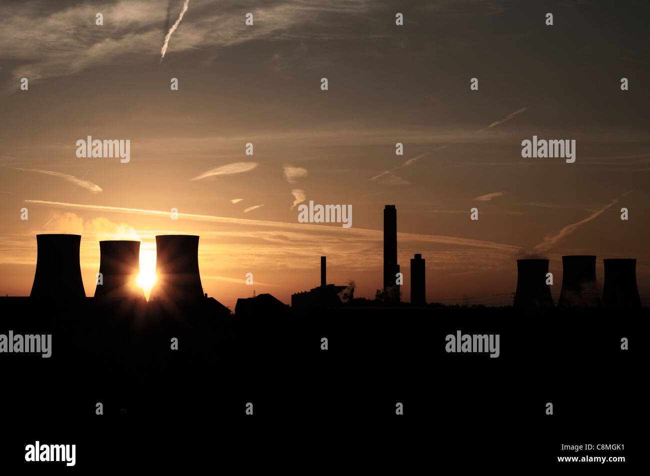 Power station at sunset Stock Photo - Alamy