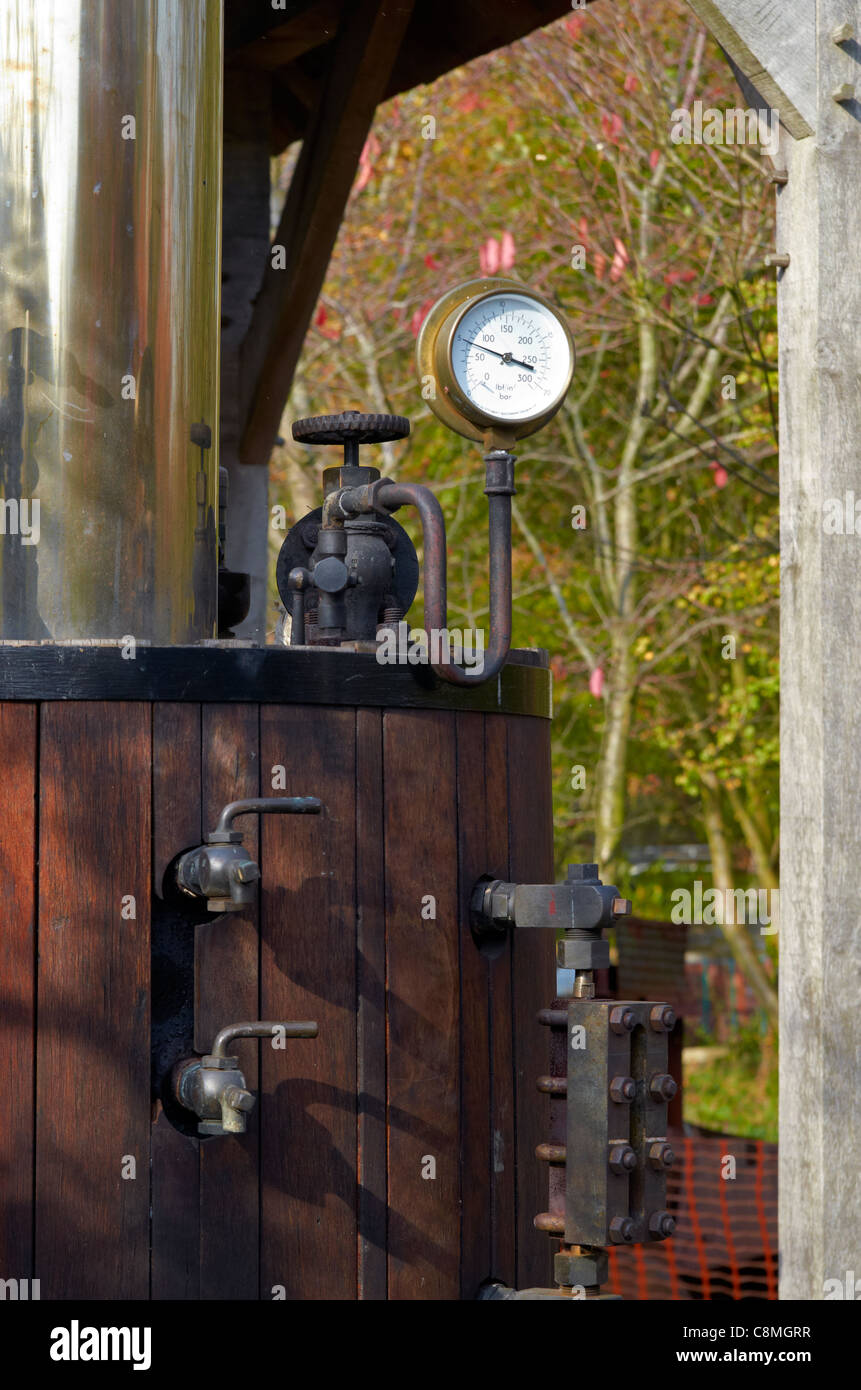Small vertical boiler steam engine used to drive a demonstration pug ...
