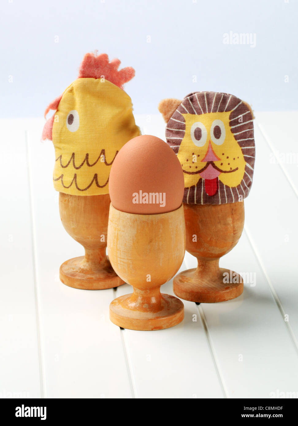 Funny animal egg cosies for boiled eggs Stock Photo - Alamy
