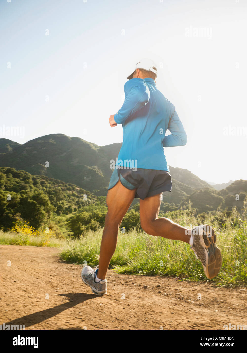 Man running back view one hi-res stock photography and images - Alamy