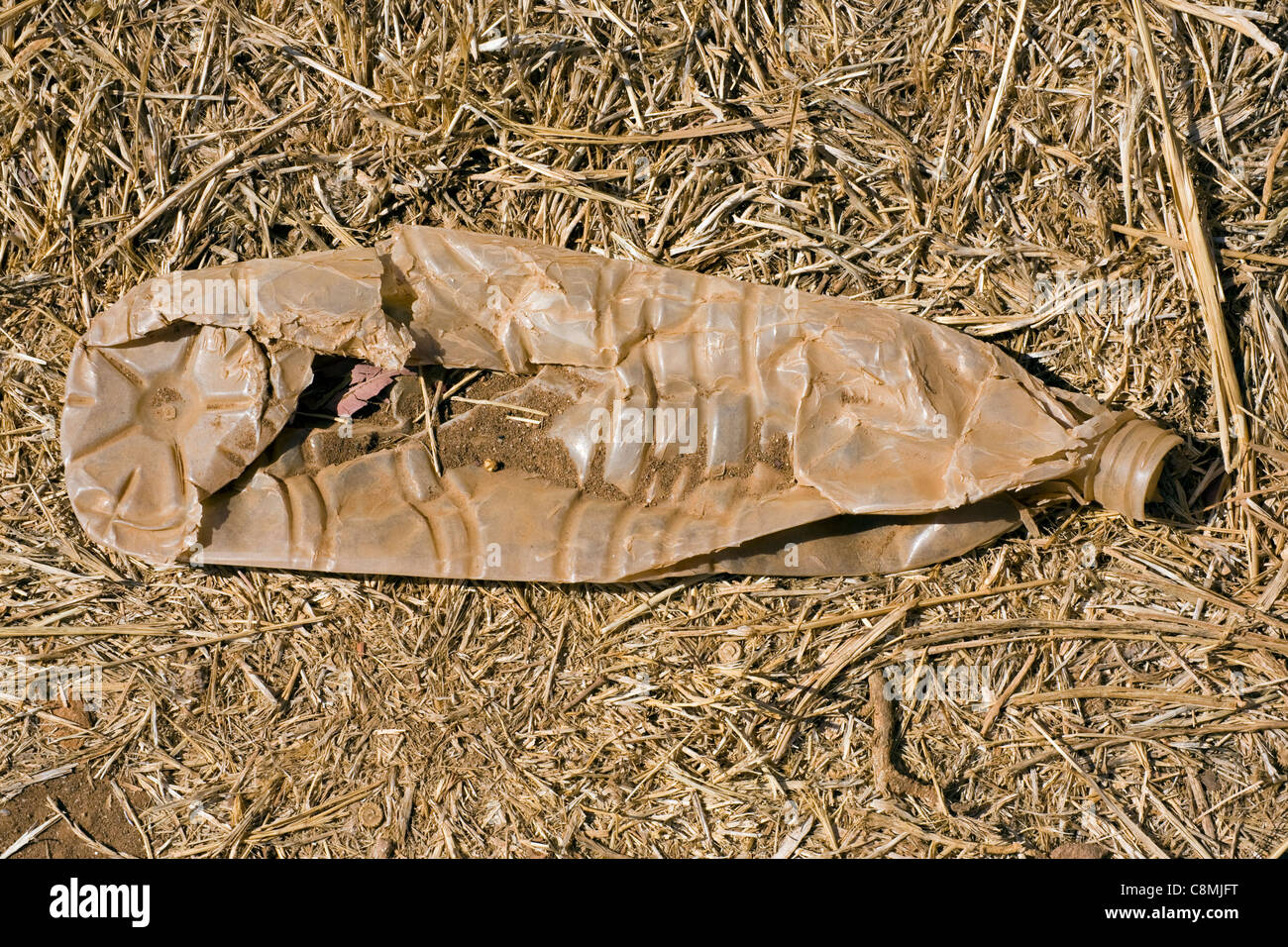 Crushed, Weathered, Plastic Bottle Stock Photo - Alamy