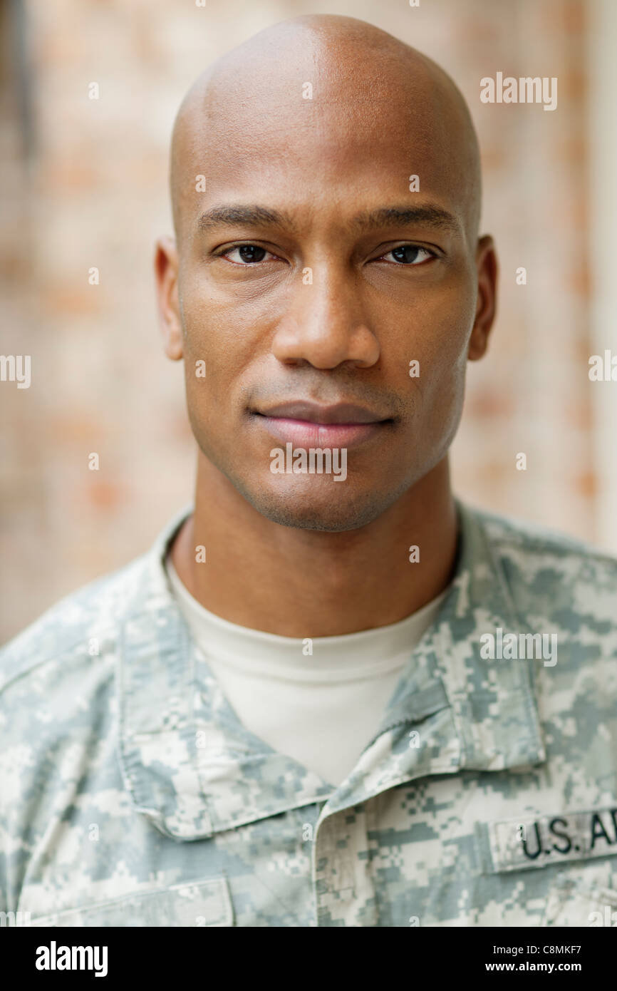 Serious Black soldier in uniform Stock Photo - Alamy