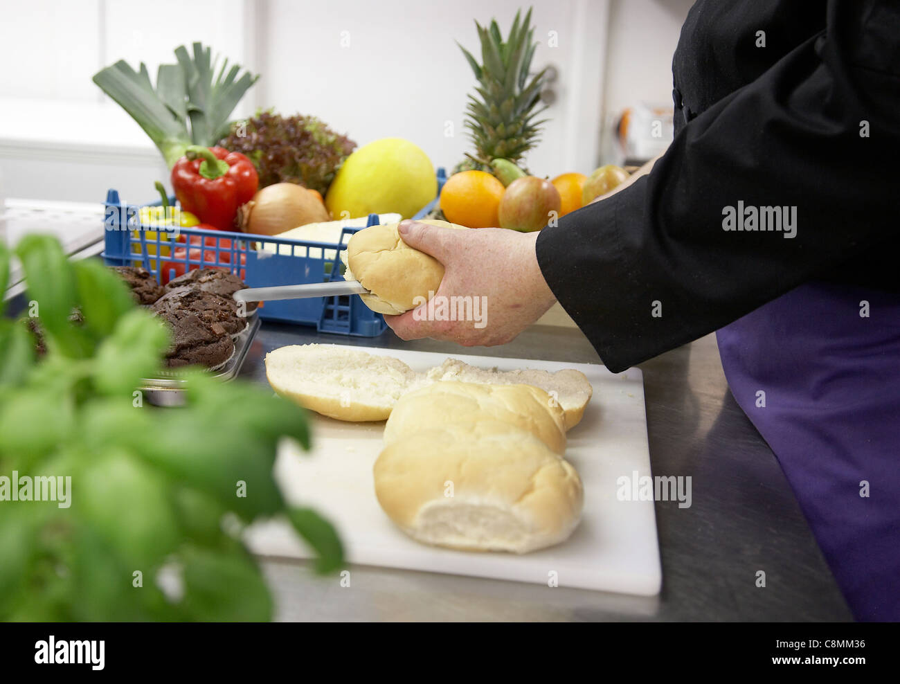 Chef slicing fresh bread on hi-res stock photography and images - Alamy