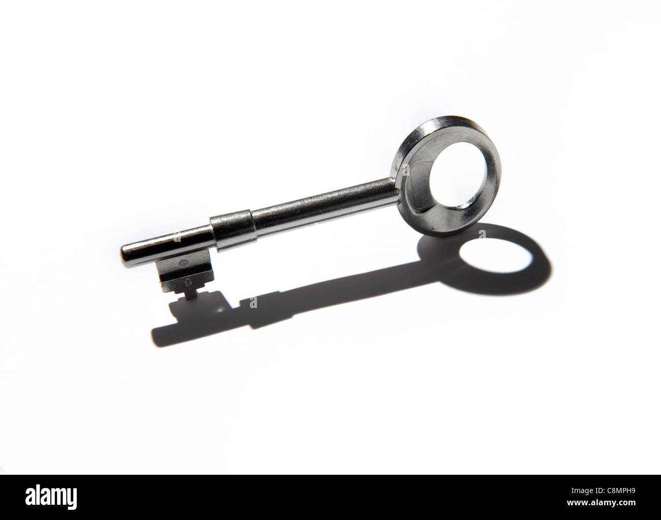 Cut out of key isolated on white background Stock Photo - Alamy