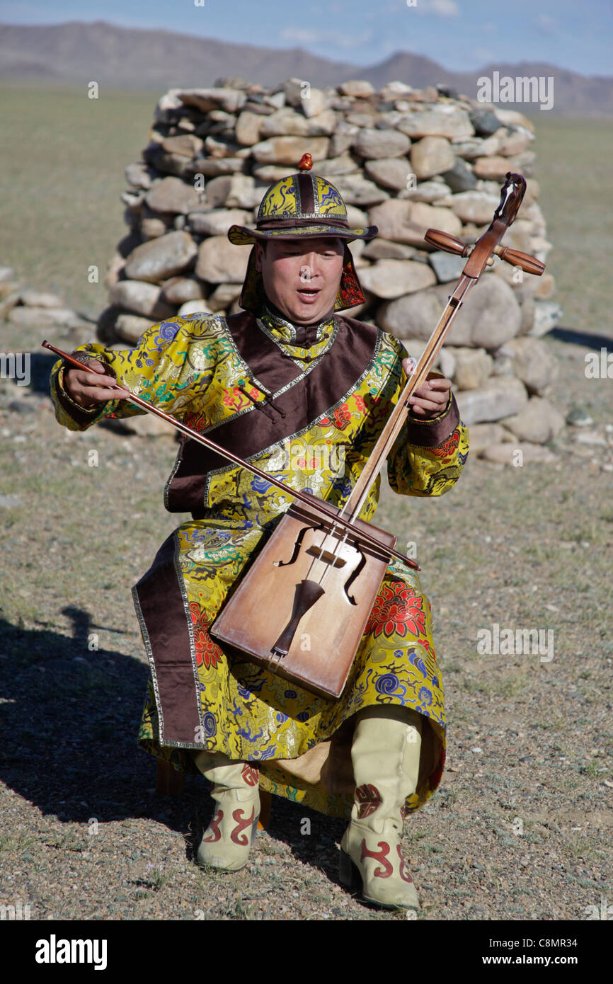 Musician playing the Morin khuur, the typical musical instrument of ...