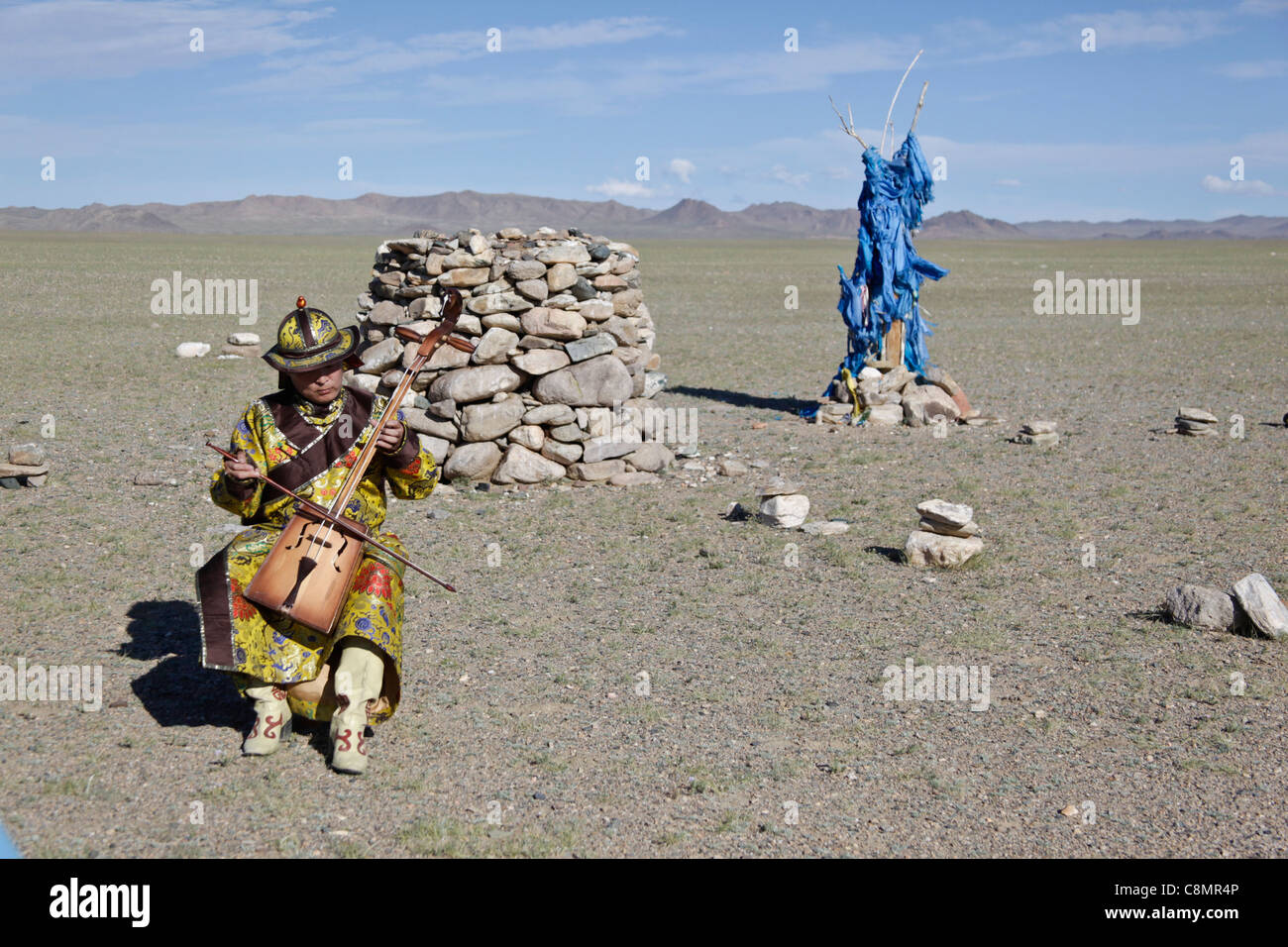 Musician playing the Morin khuur, the typical musical instrument of ...