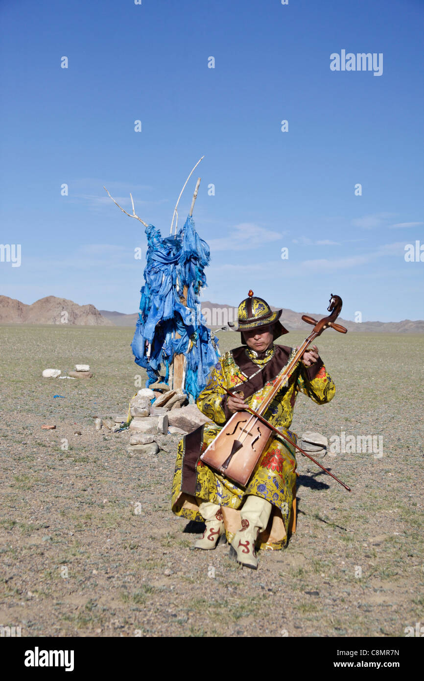 Musician playing the Morin khuur, the typical musical instrument of ...