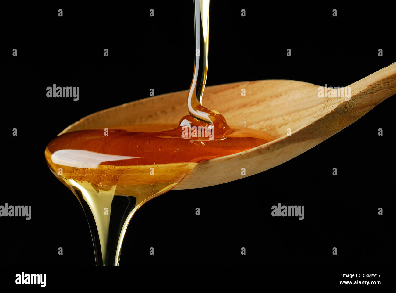 Spoon in Syrup Can Stock Photo - Alamy