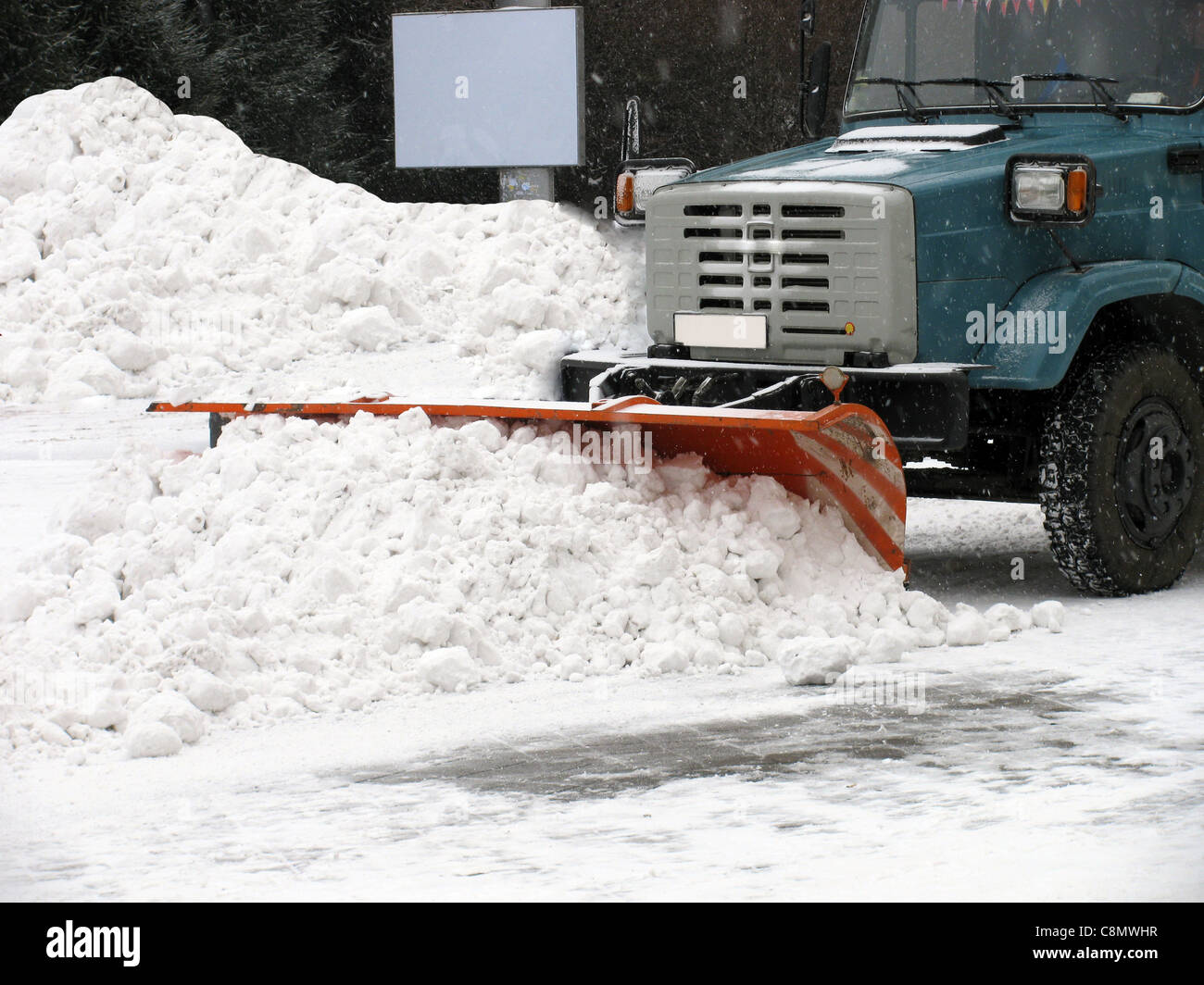 car cleaning road from snow Stock Photo - Alamy