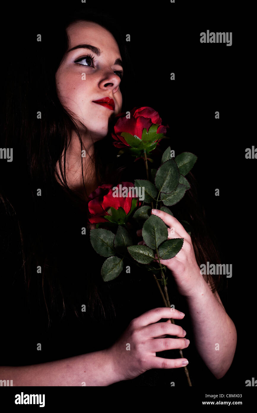 girl with red roses Stock Photo - Alamy