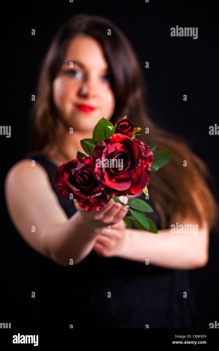 girl with red roses Stock Photo - Alamy