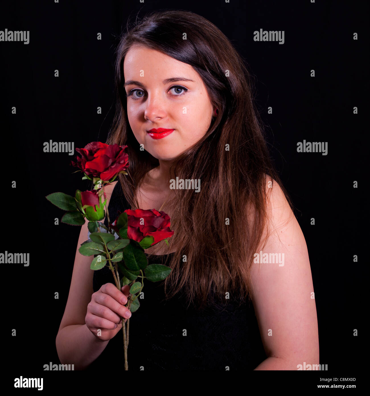 girl with red roses Stock Photo - Alamy