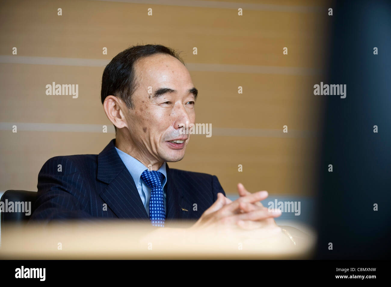 Akira Arima, president and CEO of NTT Communications Corp., poses for a photo at the company's ...
