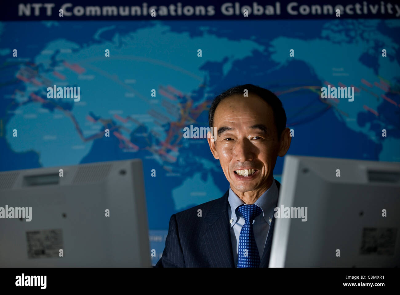 Akira Arima, president and CEO of NTT Communications Corp., poses for a ...