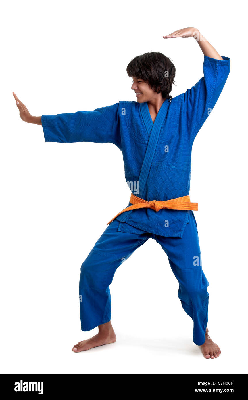 Young fighter posing against a white background Stock Photo - Alamy