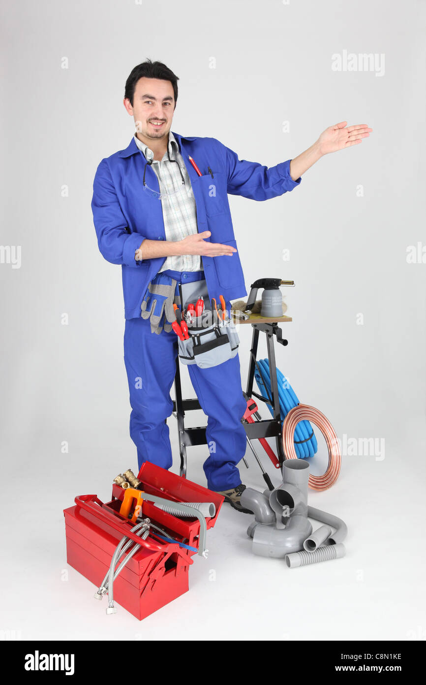 plumber showing with his hands Stock Photo - Alamy