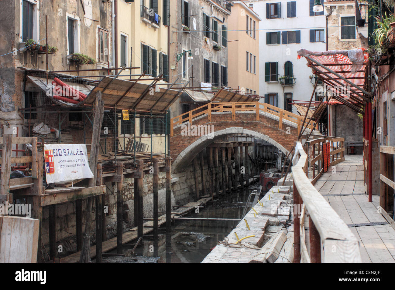 Dry canal dredging maintenance of Venice canals Stock Photo - Alamy