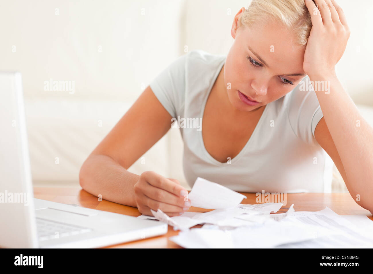 Despaired woman accounting Stock Photo - Alamy
