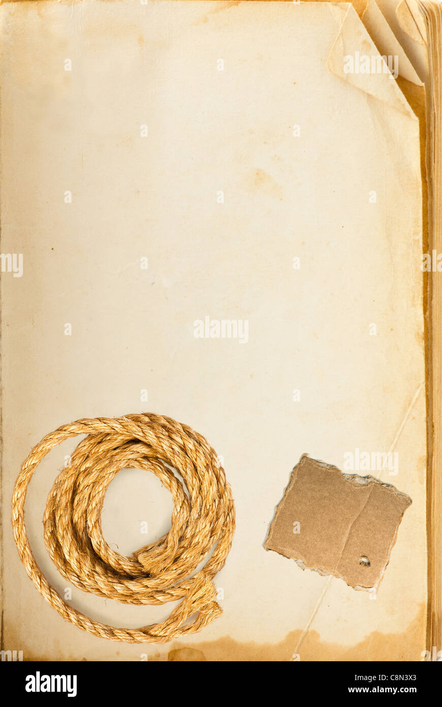 Old book page, hemp rope and cardboard blank with space for your text ...