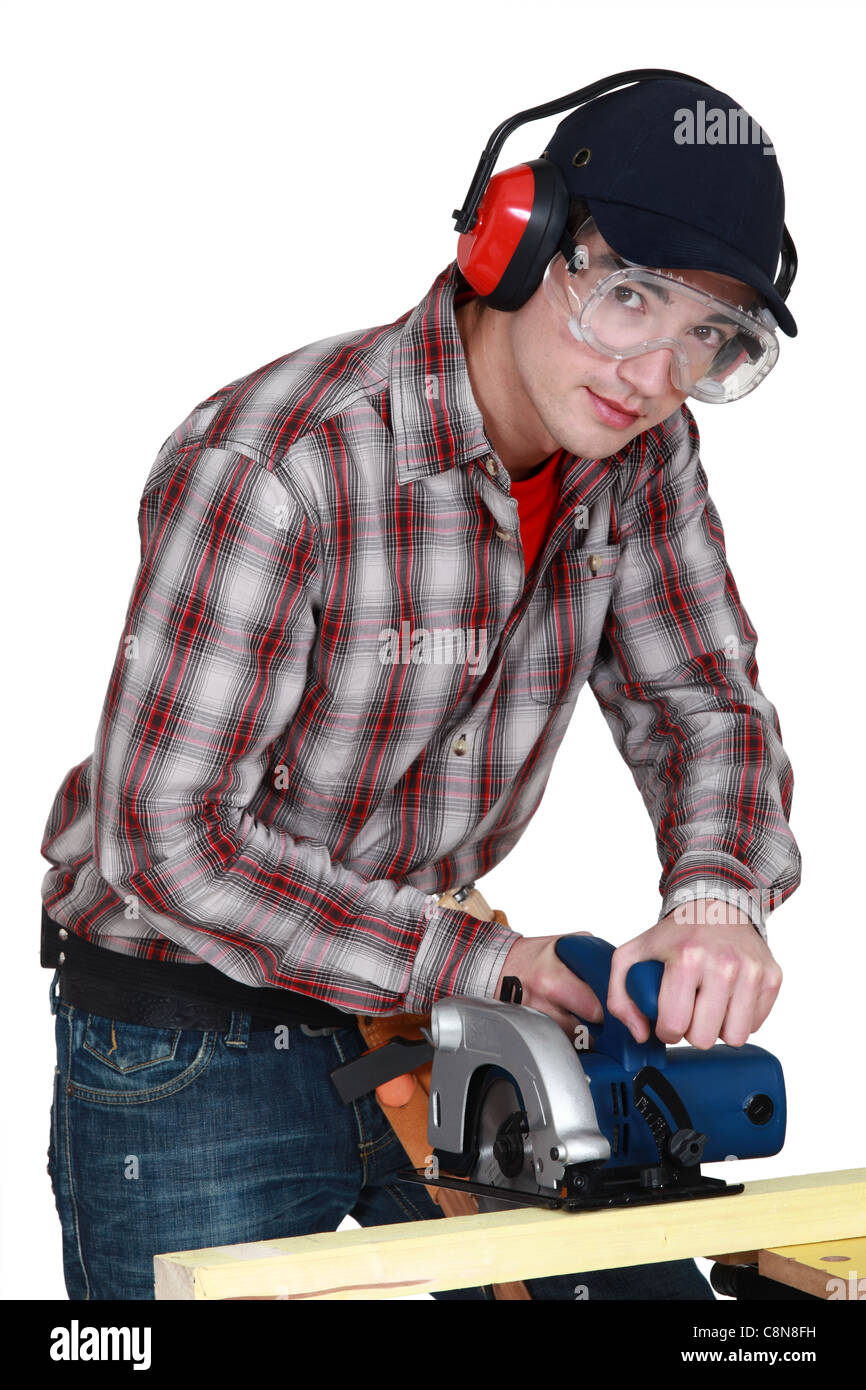 Man using circular saw Stock Photo - Alamy