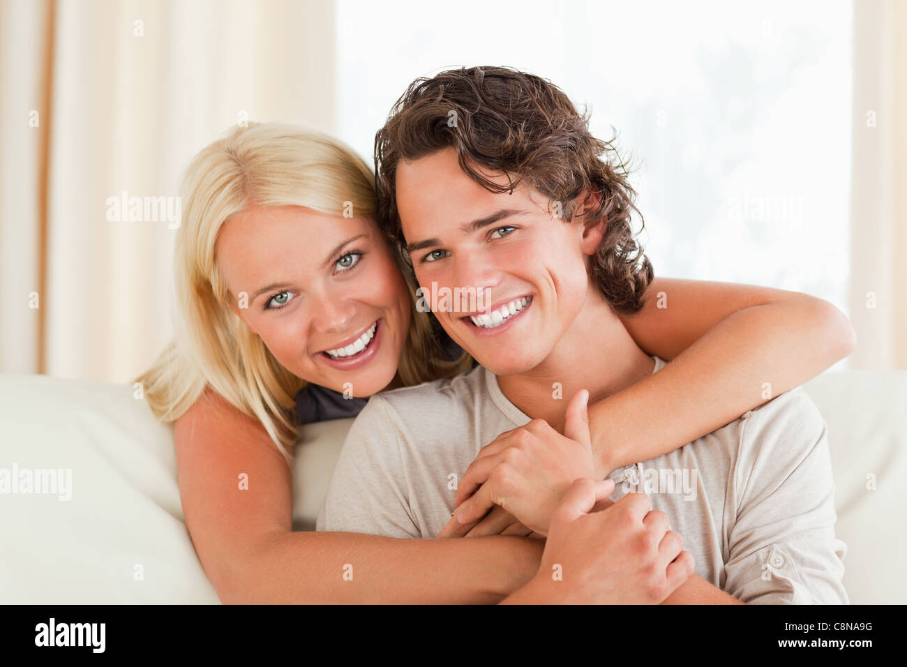 Cute couple hugging Stock Photo - Alamy