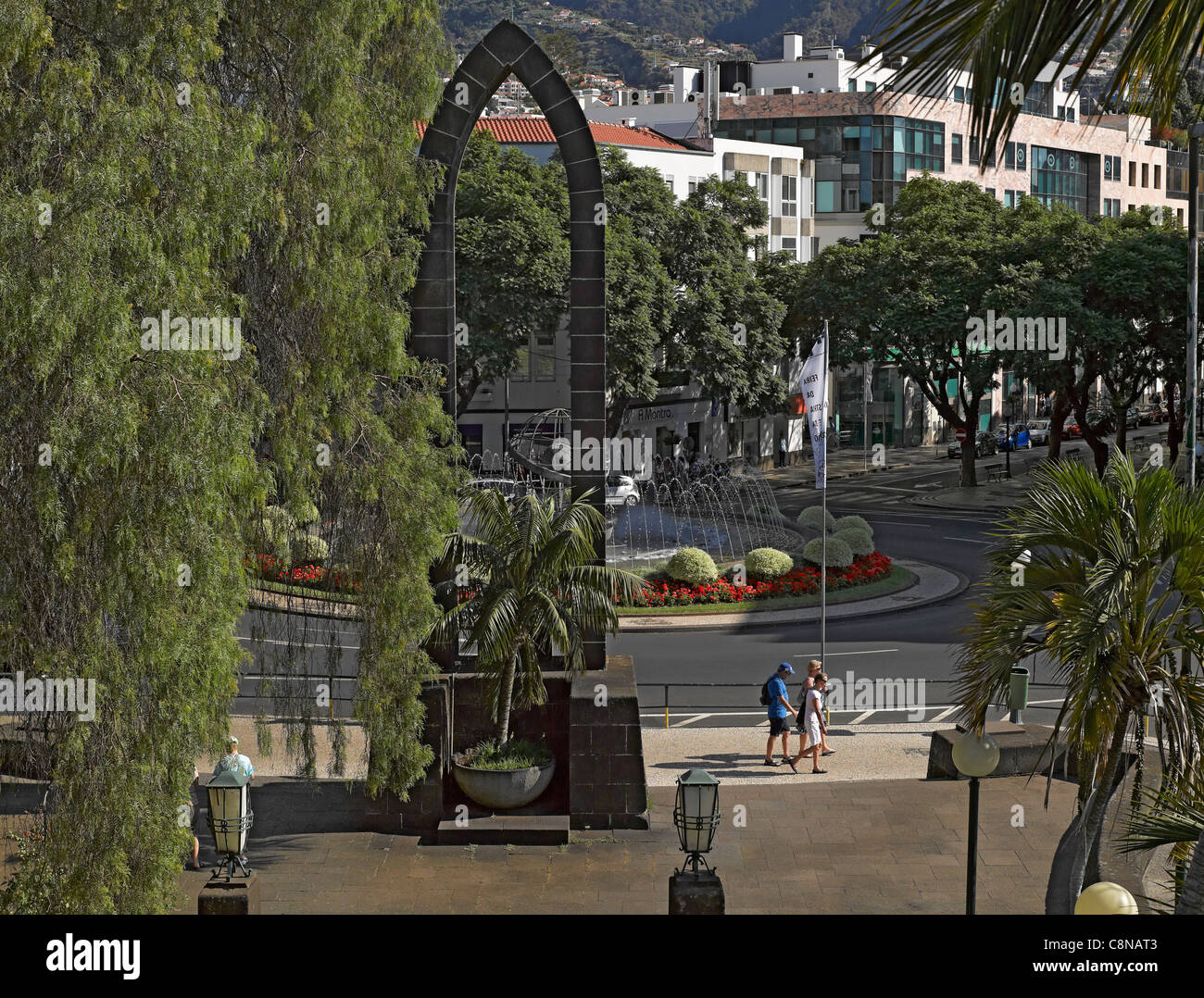 People tourists visitors at the Rotunda Do Infante roundabout and ...