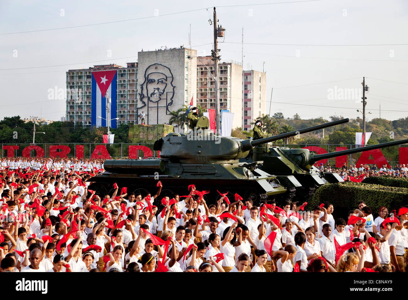 Cuban students, army tanks and guns at military parade in Havana, Cuba ...